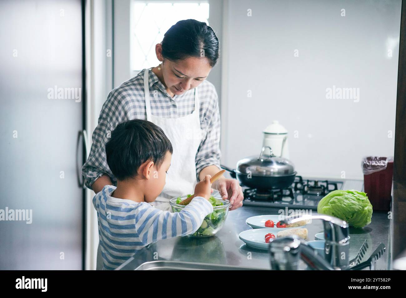 Two boys cooking at school hi-res stock photography and images - Alamy