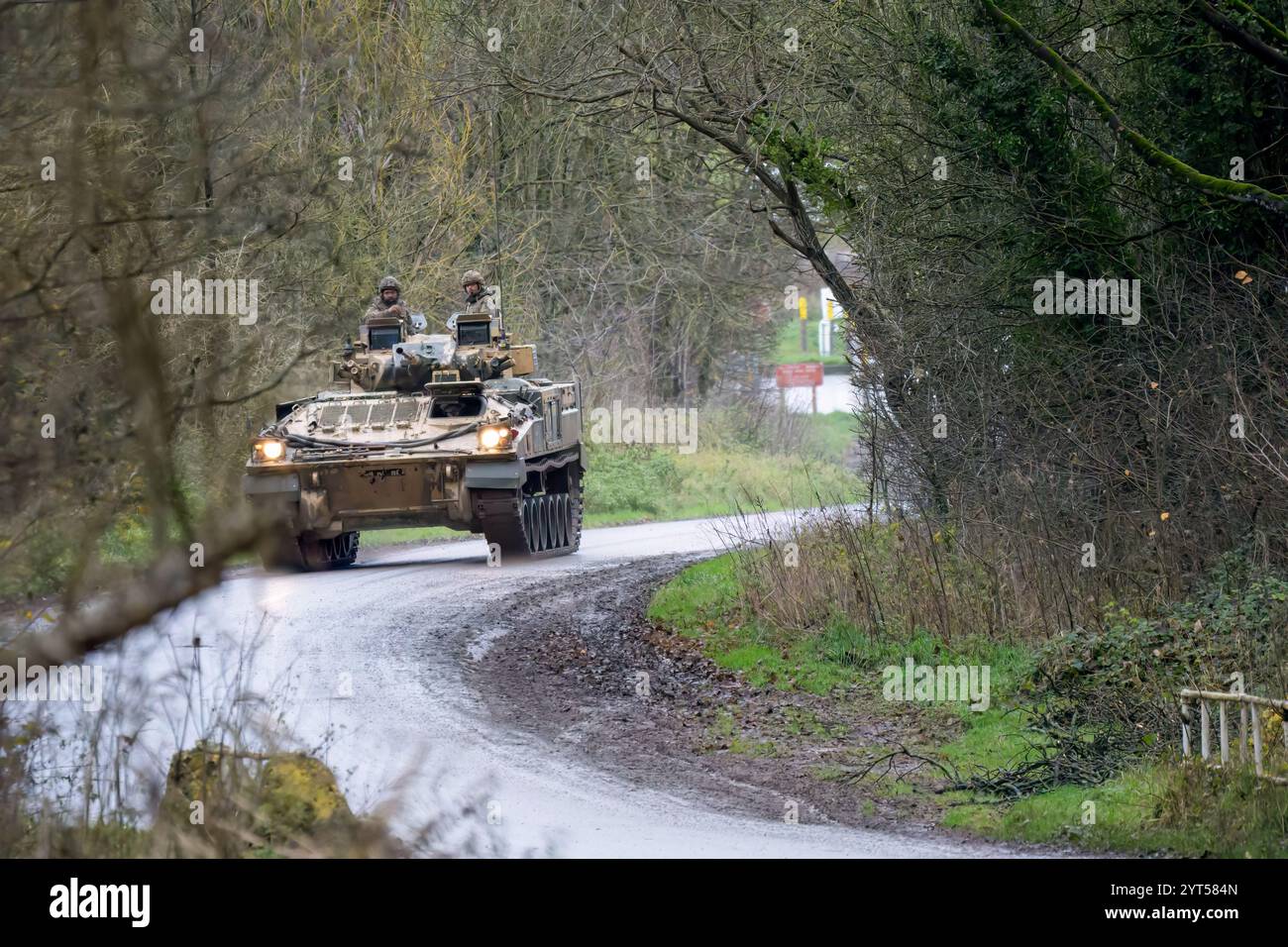 commander and gunner directing a British army Warrior FV510 IFV in ...
