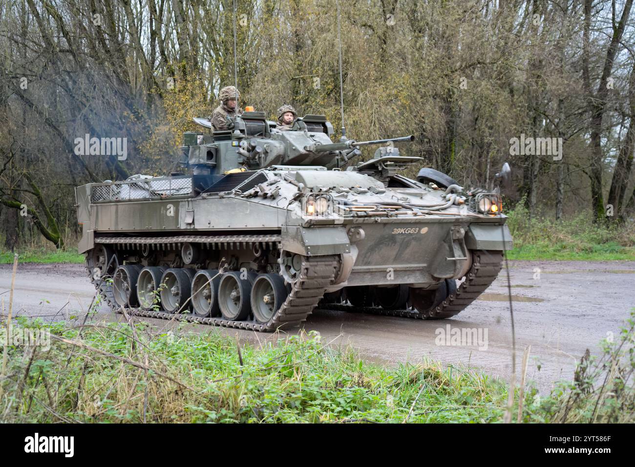 commander and gunner directing a British army Warrior FV510 IFV in ...
