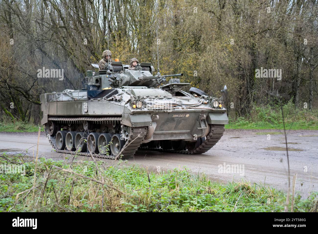 commander and gunner directing a British army Warrior FV510 IFV in ...