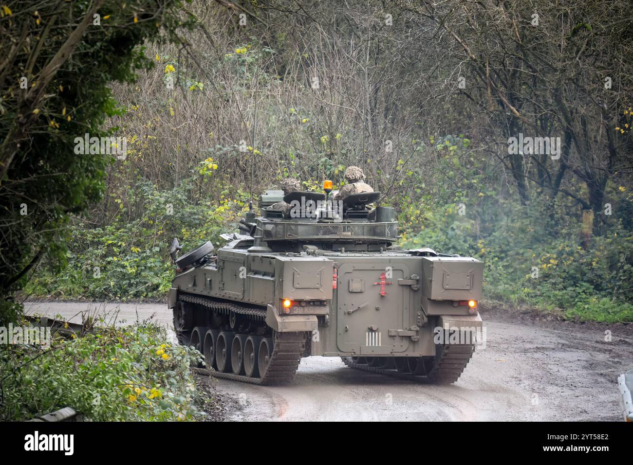 commander and gunner directing a British army Warrior FV510 IFV in ...