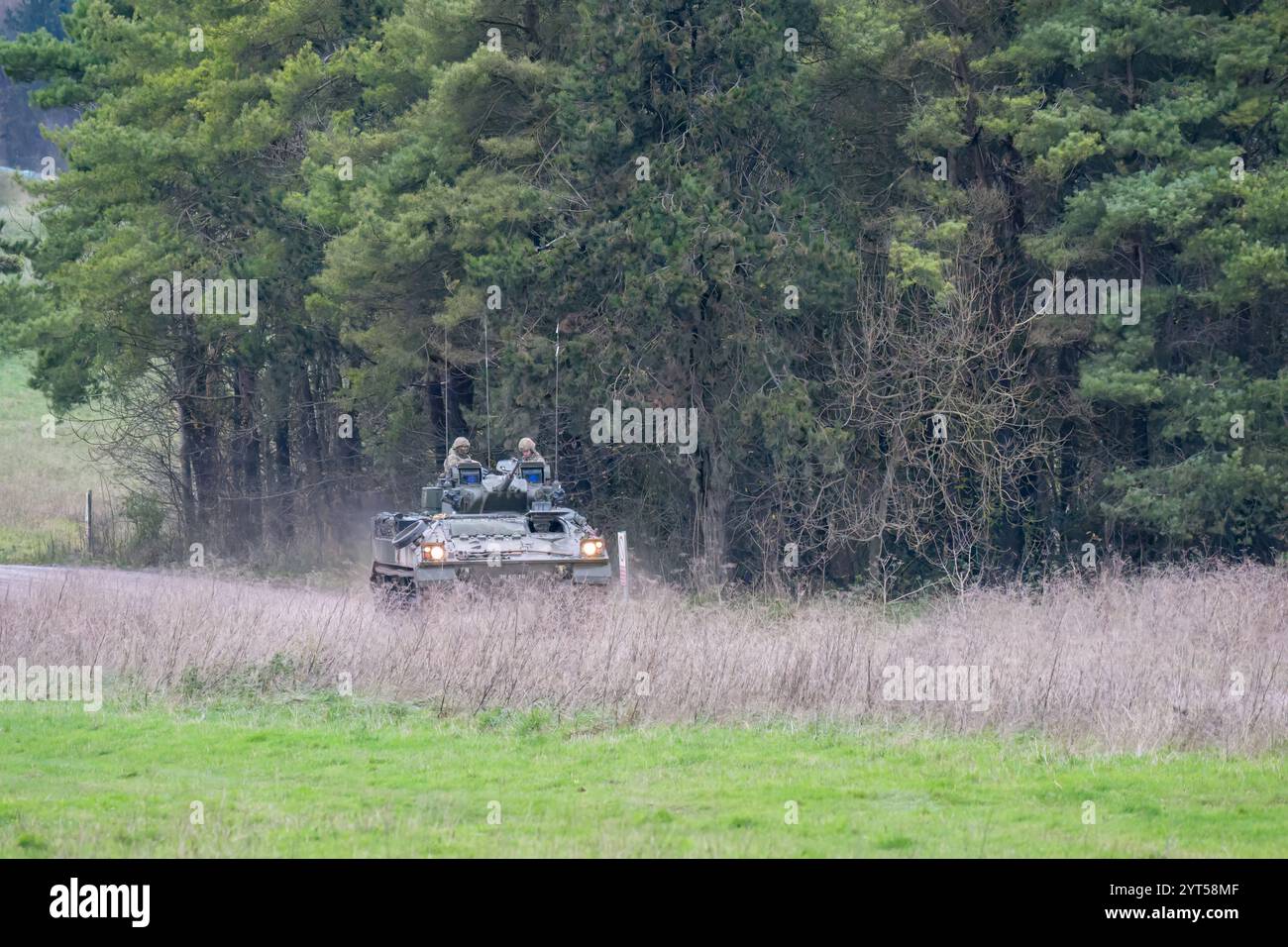 commander and gunner directing a British army Warrior FV510 IFV in ...