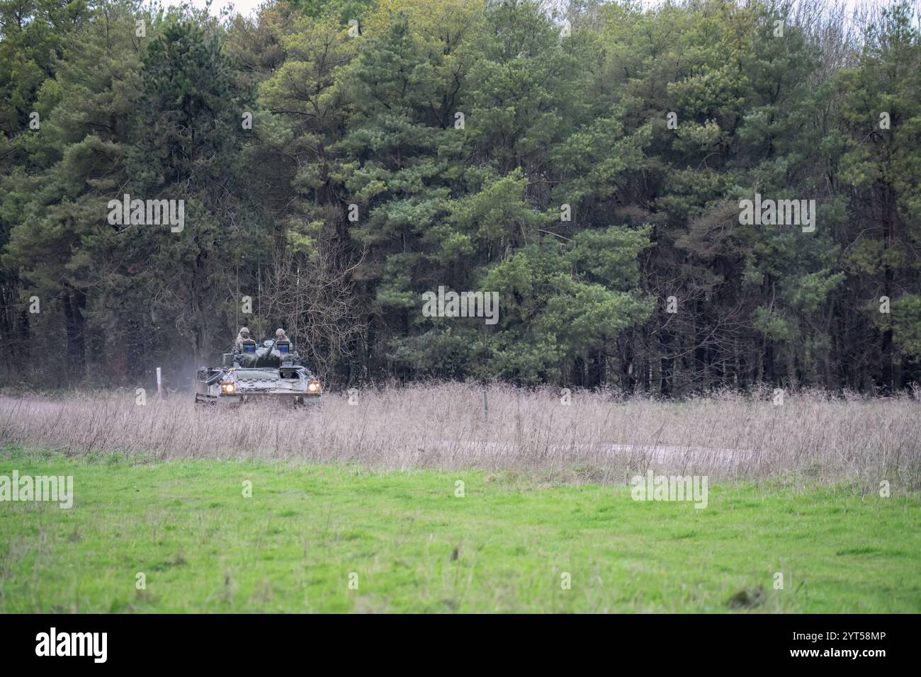 commander and gunner directing a British army Warrior FV510 IFV in ...
