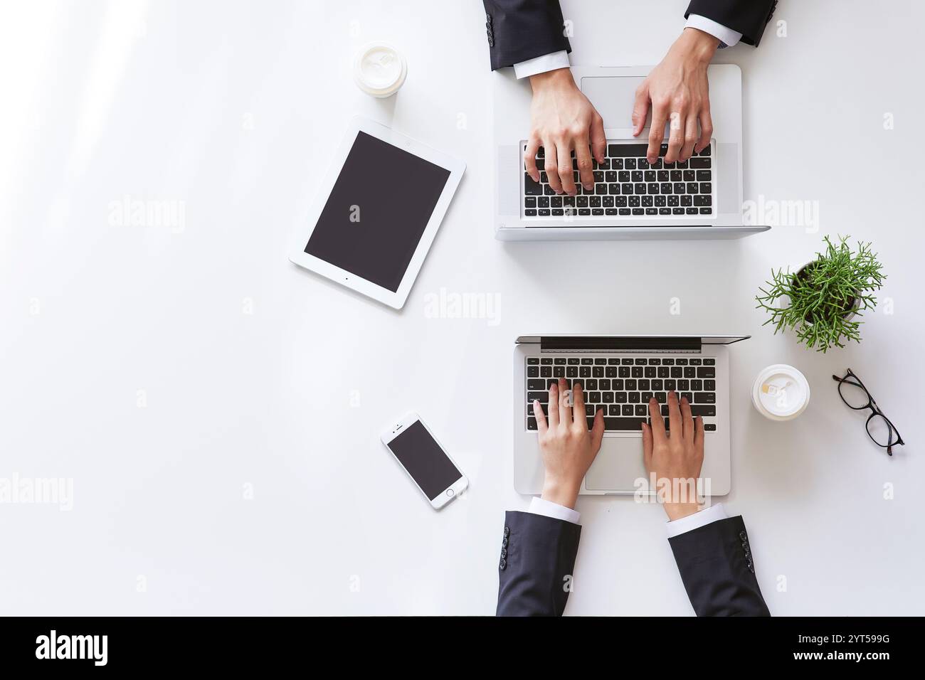 Woman and man's hand at work Stock Photo - Alamy