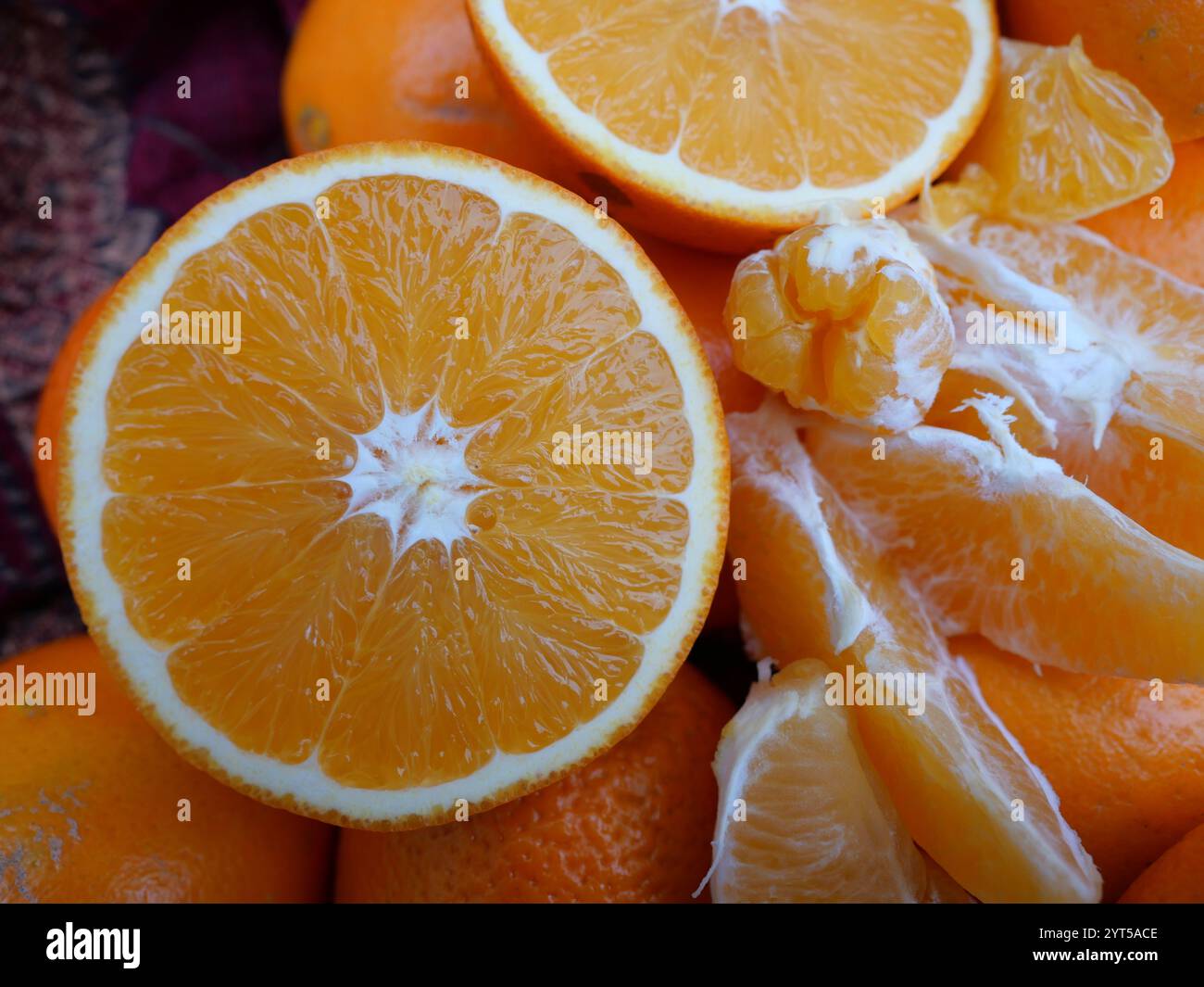 Oranges, fresh and juicy, display stunning textures in their pulp ...
