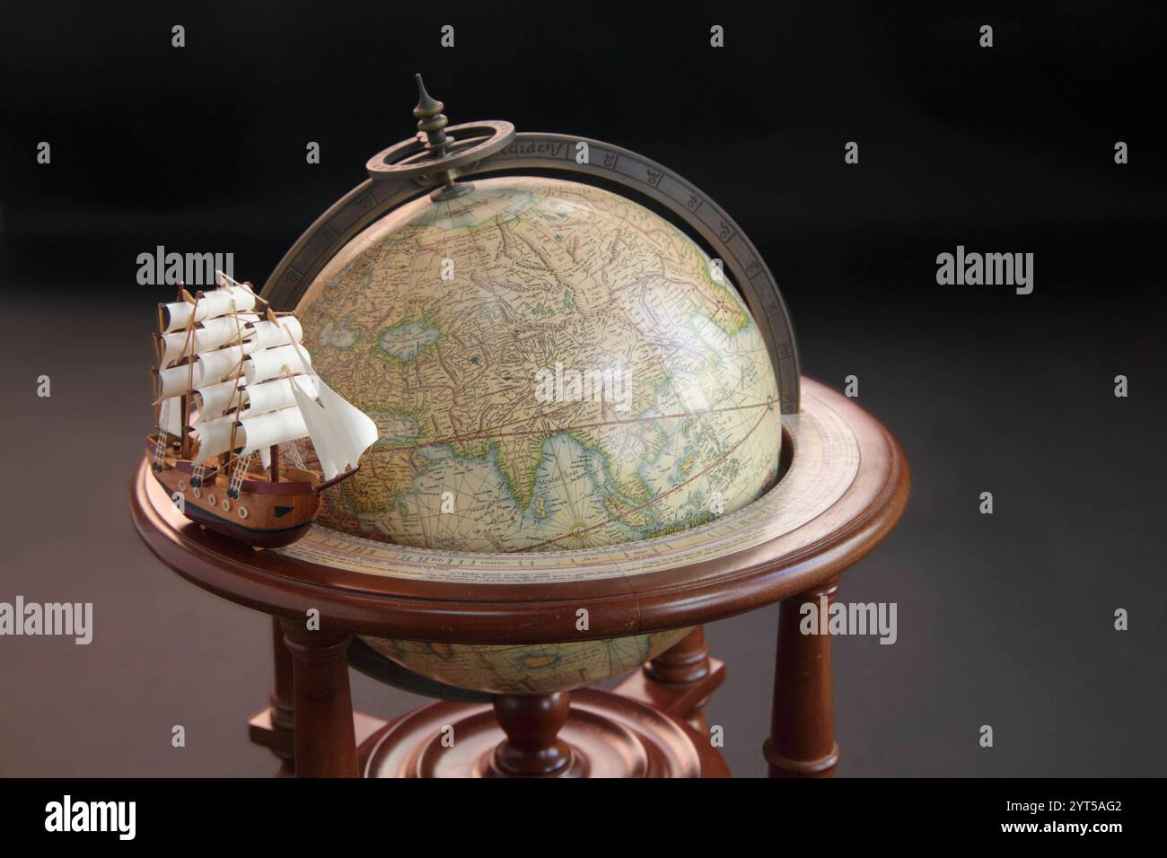 Old globe and sailing ship Stock Photo - Alamy