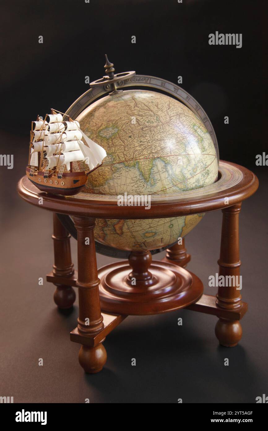 Old globe and sailing ship Stock Photo - Alamy