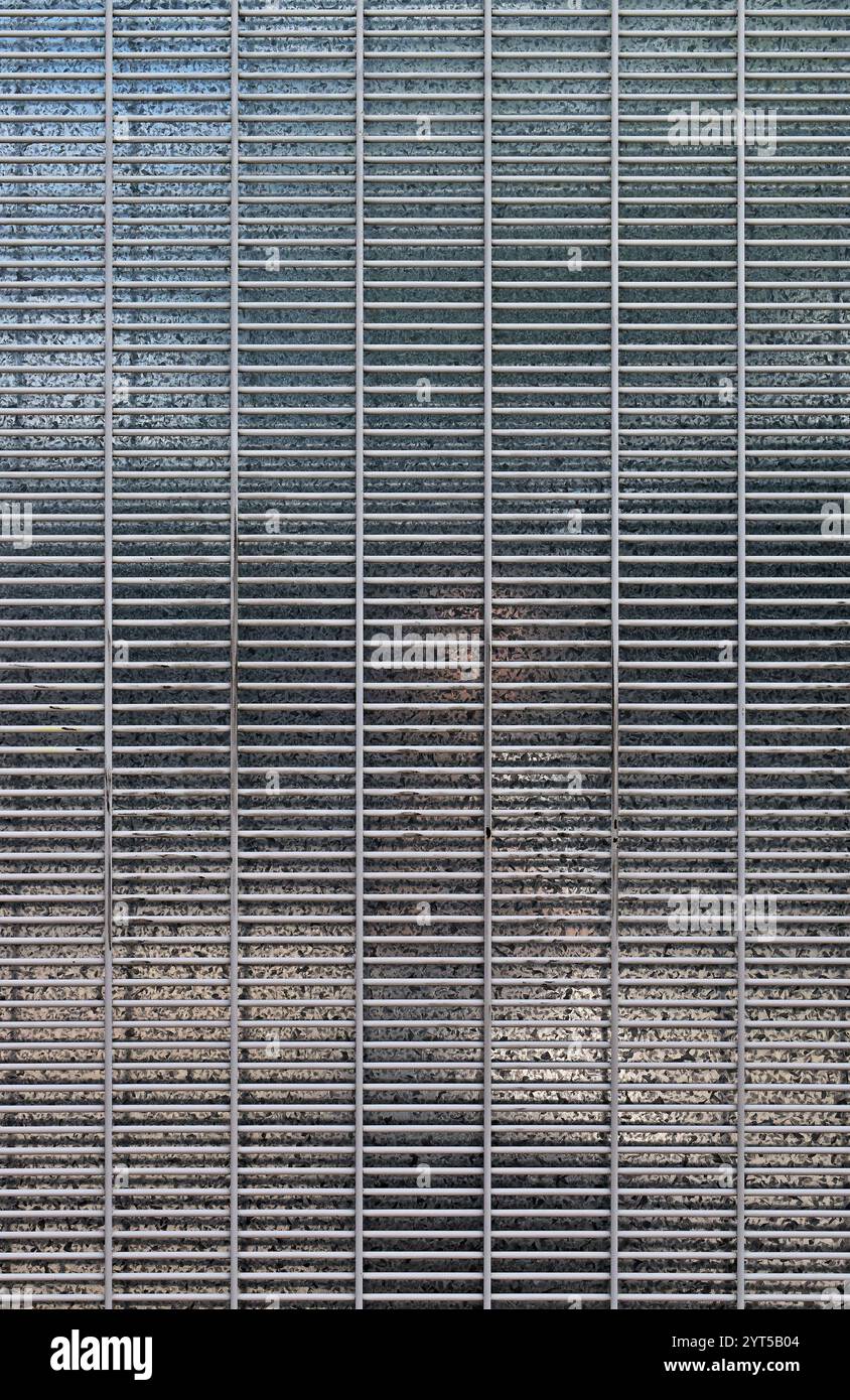 Metal grid on metallic surface Stock Photo - Alamy