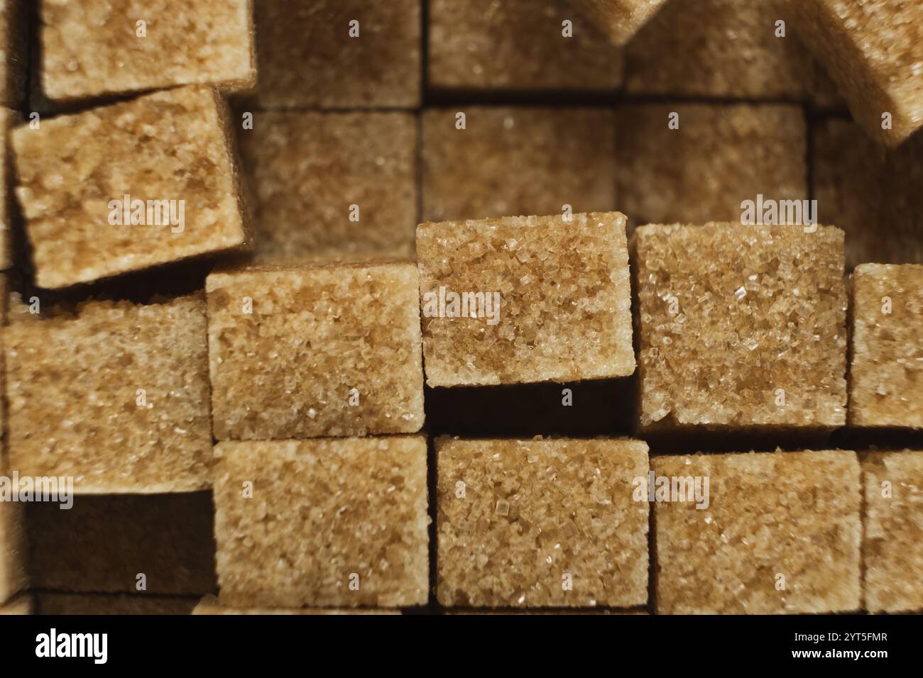 Cubes of brown cane unrefined demerara sugar Stock Photo - Alamy