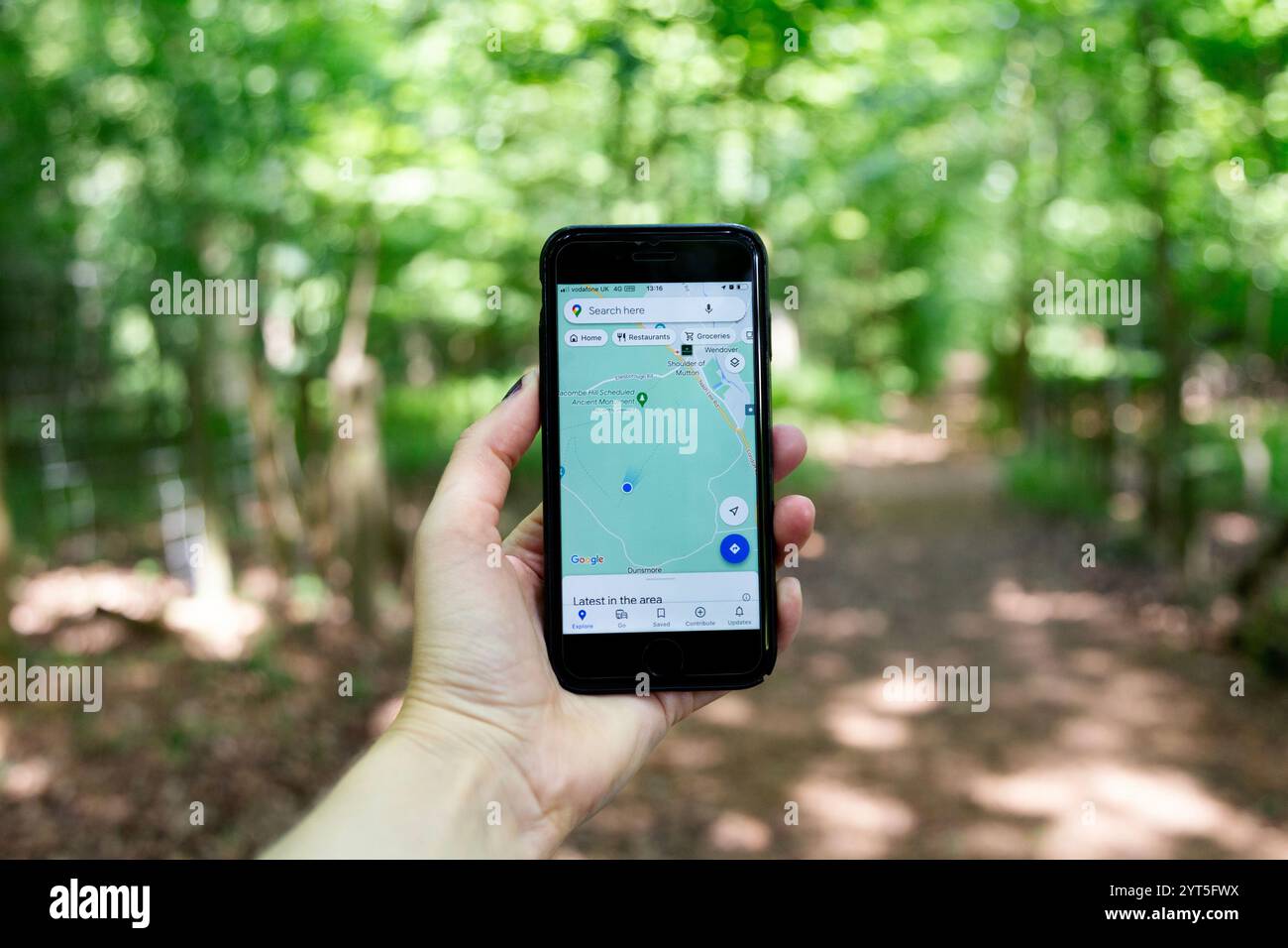 Hiker using google maps hi-res stock photography and images - Alamy