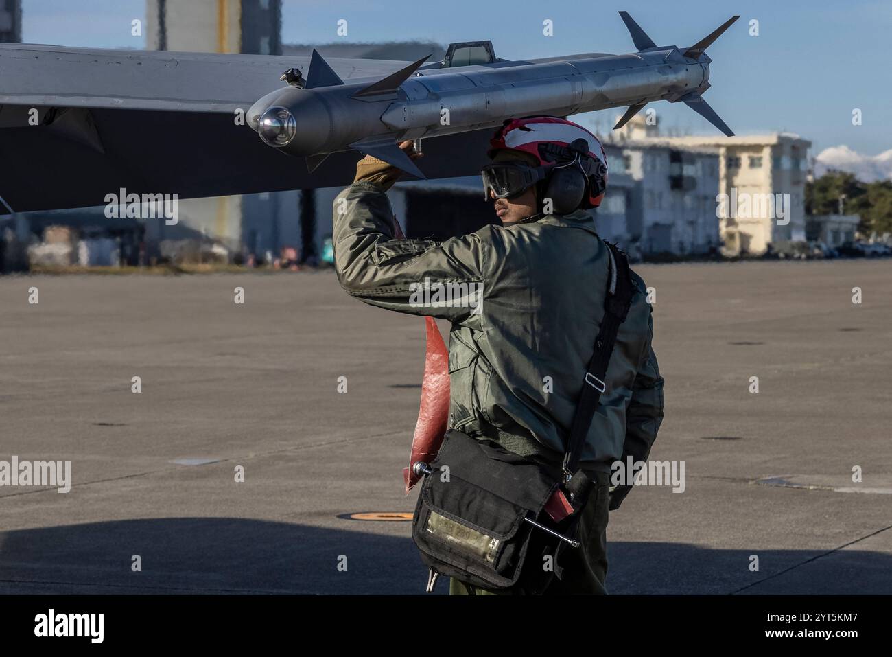 U.S. Marine Corps Lance Cpl. Tanvir Amin, an aircraft ordnance ...