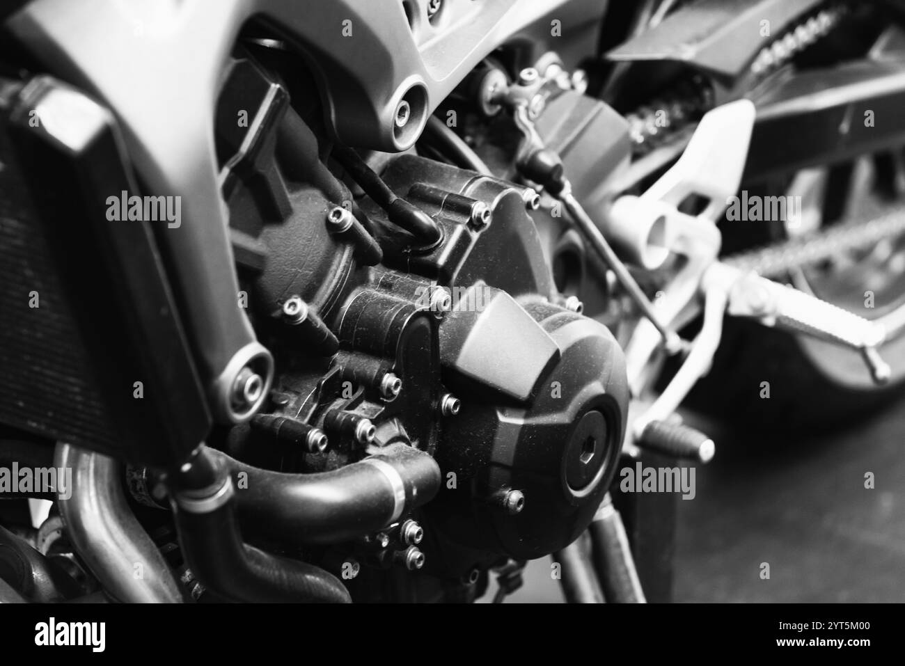 A speed bike close-up details view, engine and transmission, black and ...