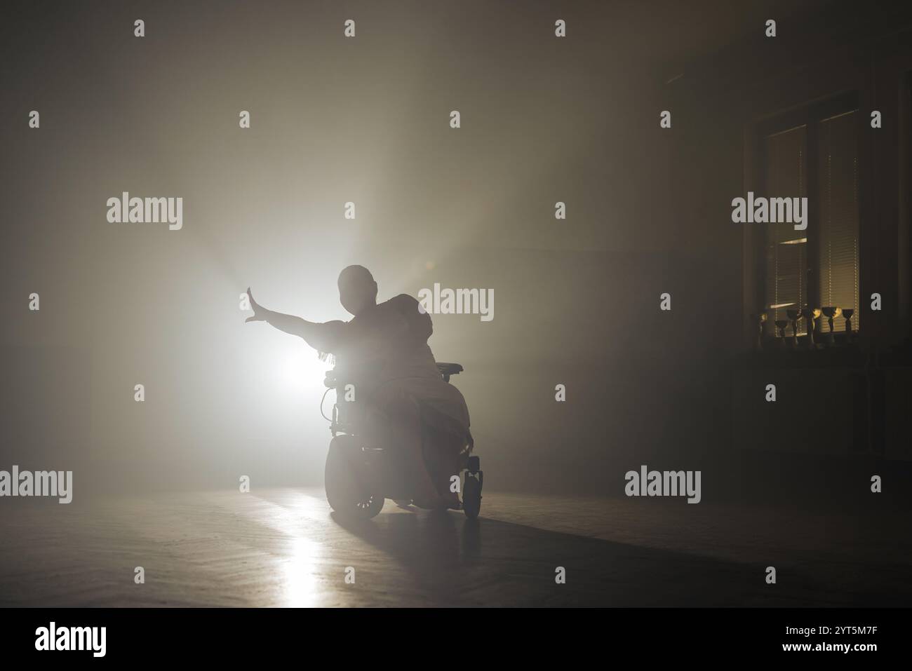 Expressive wheelchair dance choreography performed by a woman with a ...
