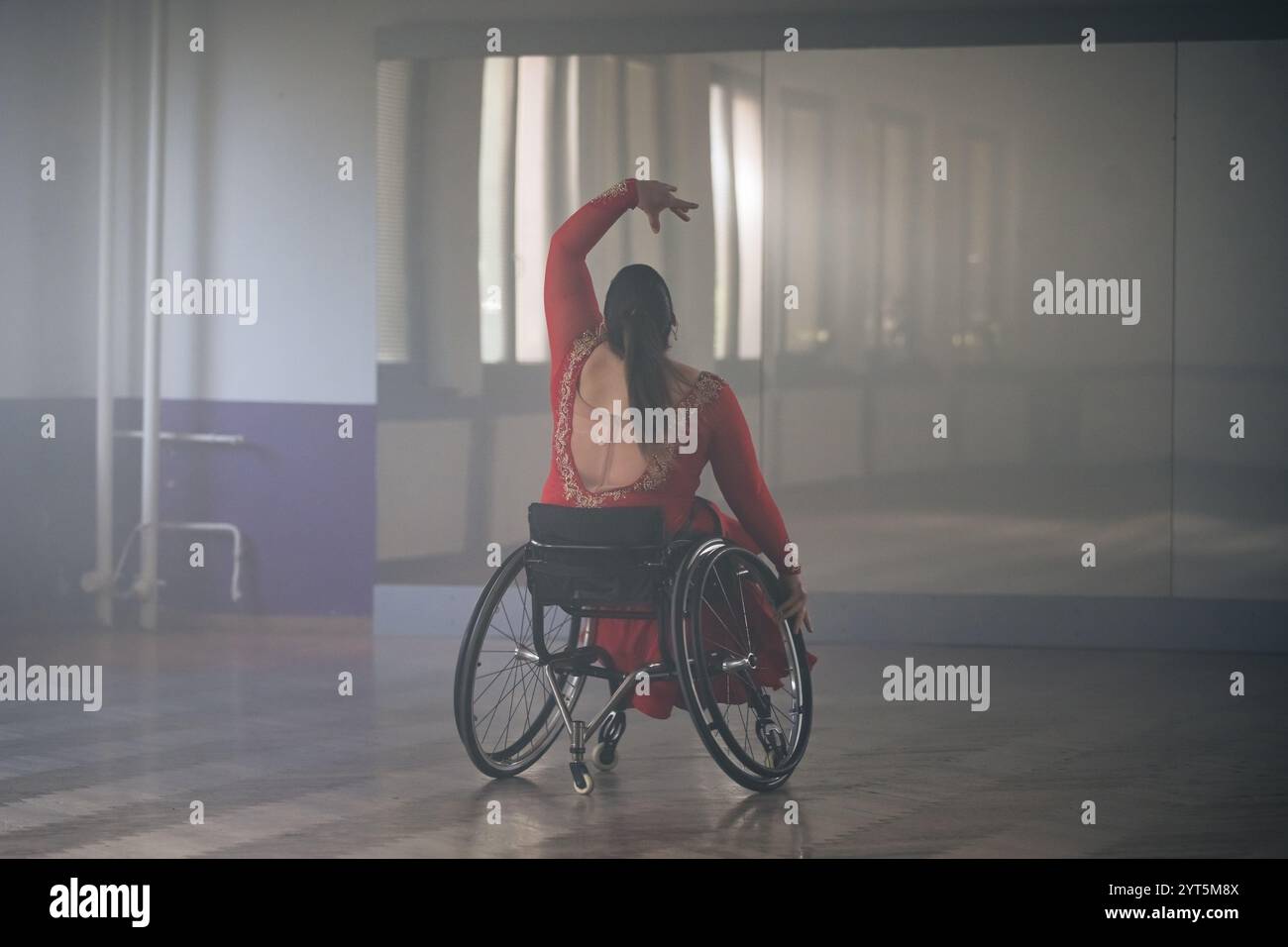 Beautiful dance in a wheelchair of a woman with disability at a dancing ...