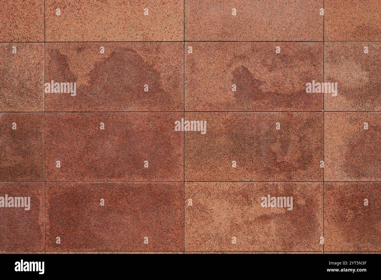 Granite tile wall, bricks, memorial cladding. Even rectangular red ...