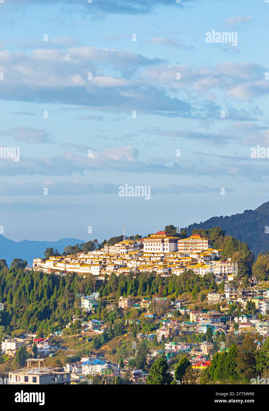 Morning sunlight illuminating the stunning Tawang Monastery amidst its ...