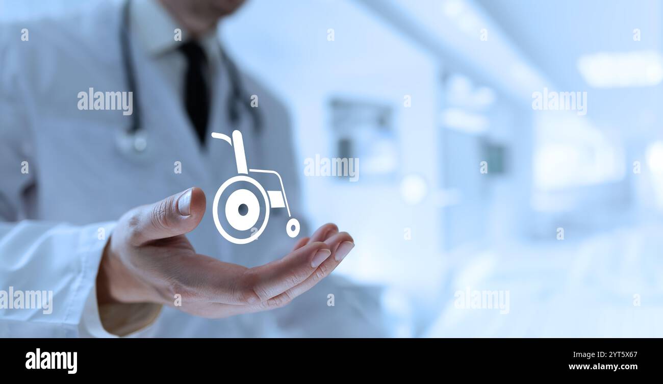 A doctor opens their palm to reveal a wheelchair icon, representing ...
