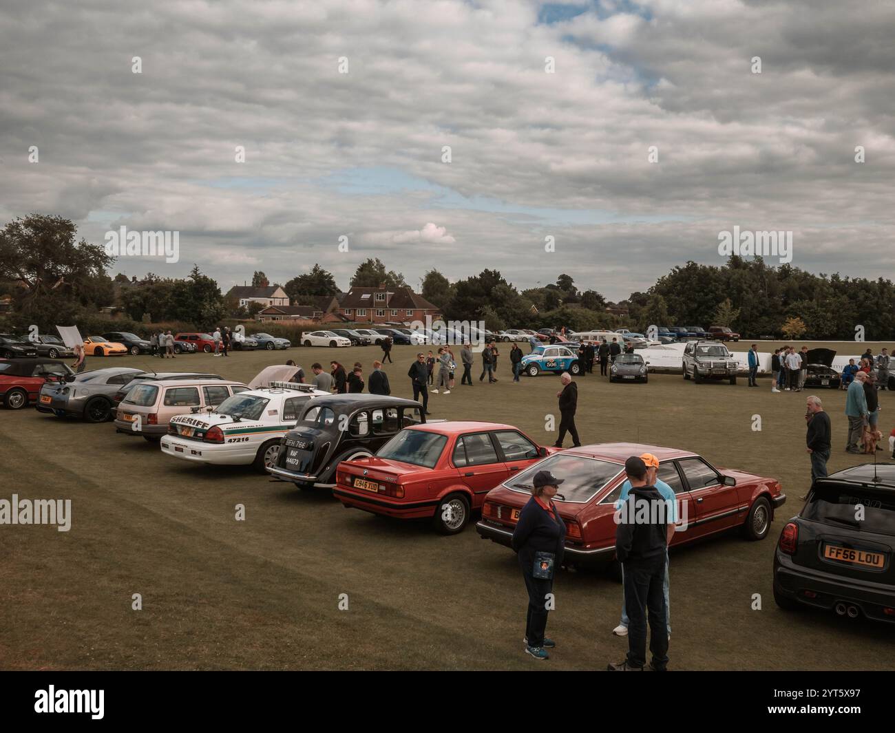 A classic car meet on a cricket pitch in Oxfordshire Stock Photo - Alamy
