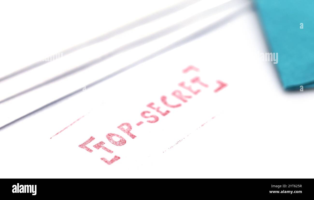 Top secret stamp sign in a paper Stock Photo - Alamy