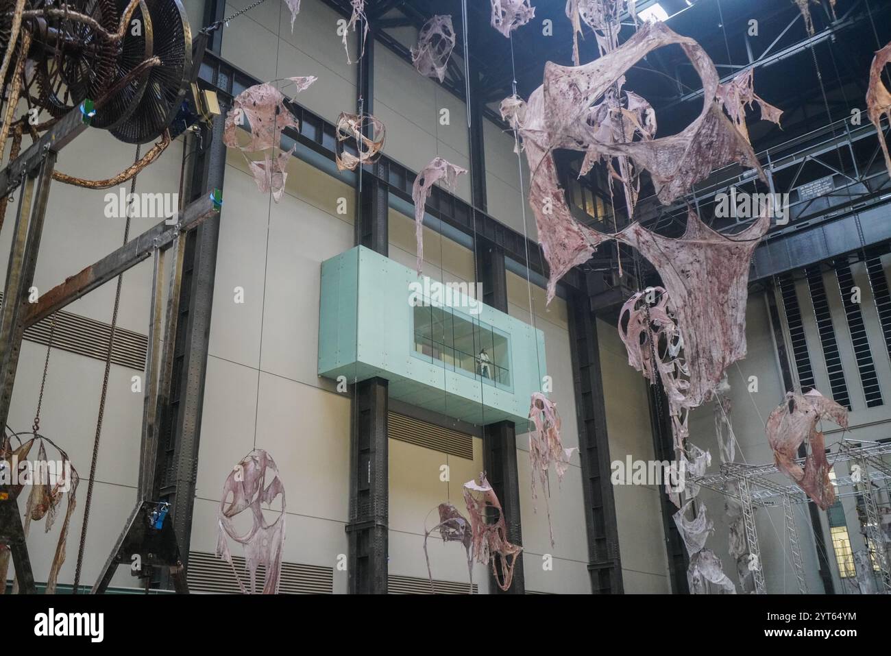 Open Wound with fabric hanging sculptures and mechanical installations ...