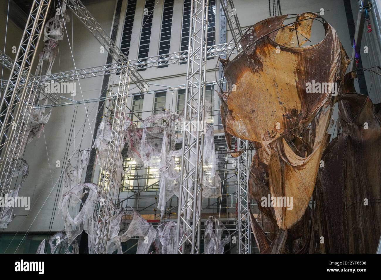 Open Wound with fabric hanging sculptures and mechanical installations ...