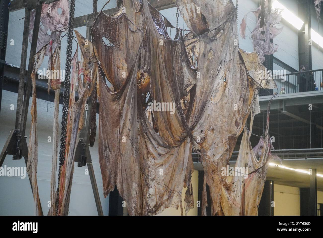 Open Wound with fabric hanging sculptures and mechanical installations ...