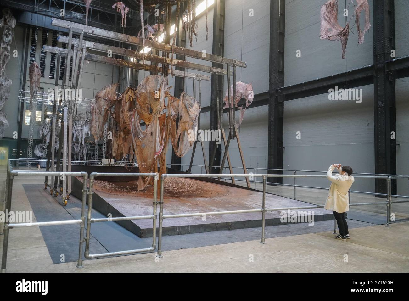 Open Wound with fabric hanging sculptures and mechanical installations ...