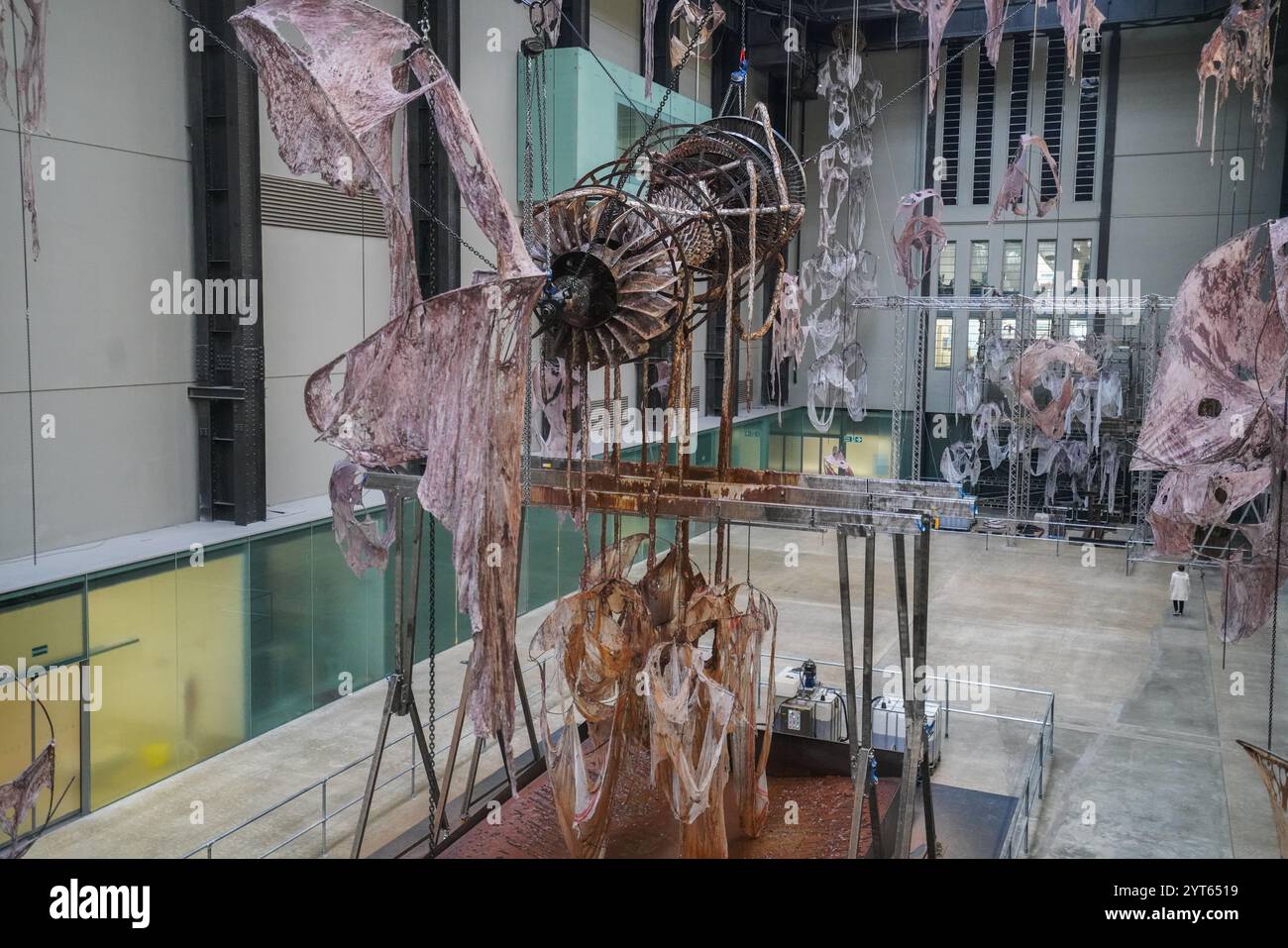 Open Wound with fabric hanging sculptures and mechanical installations ...