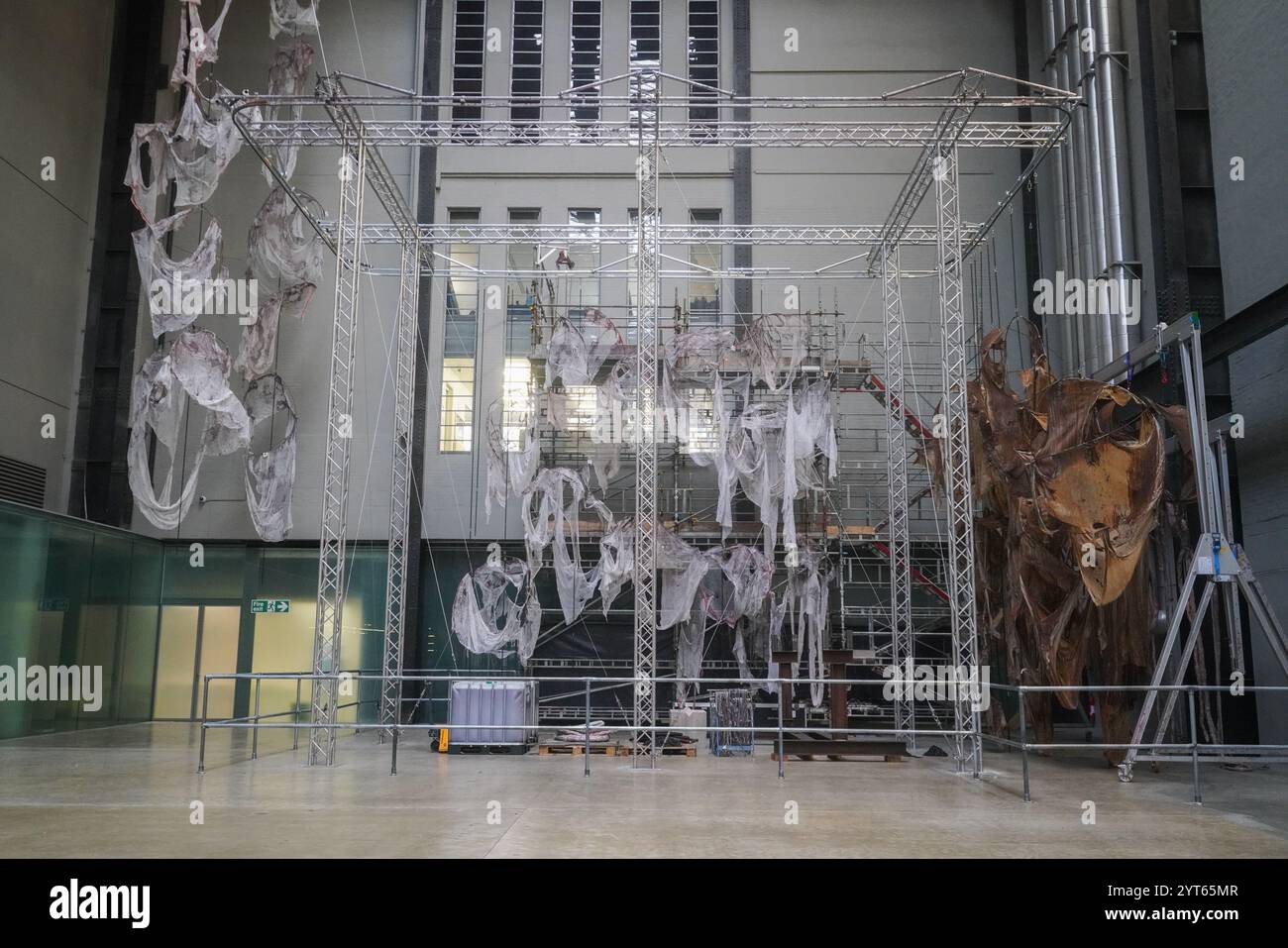 Open Wound with fabric hanging sculptures and mechanical installations ...