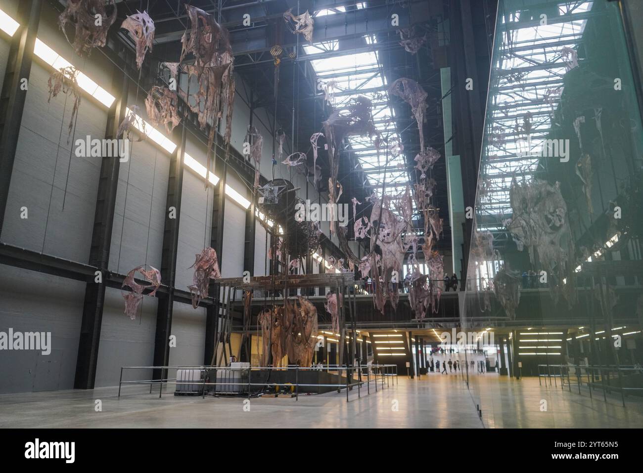 Open Wound with fabric hanging sculptures and mechanical installations ...