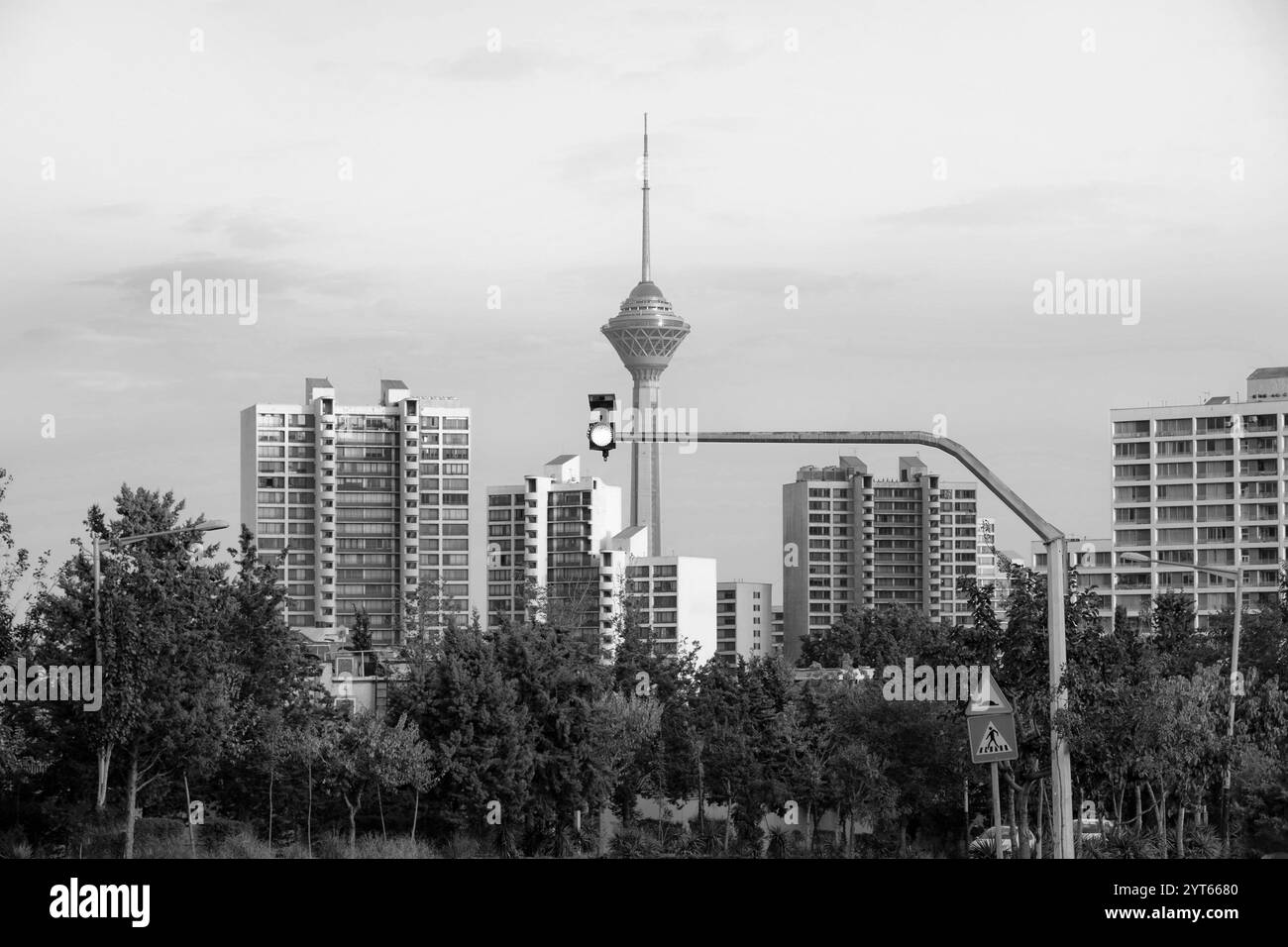 The Milad Tower in Tehran city, Iran, surrounded by high-rise buildings ...