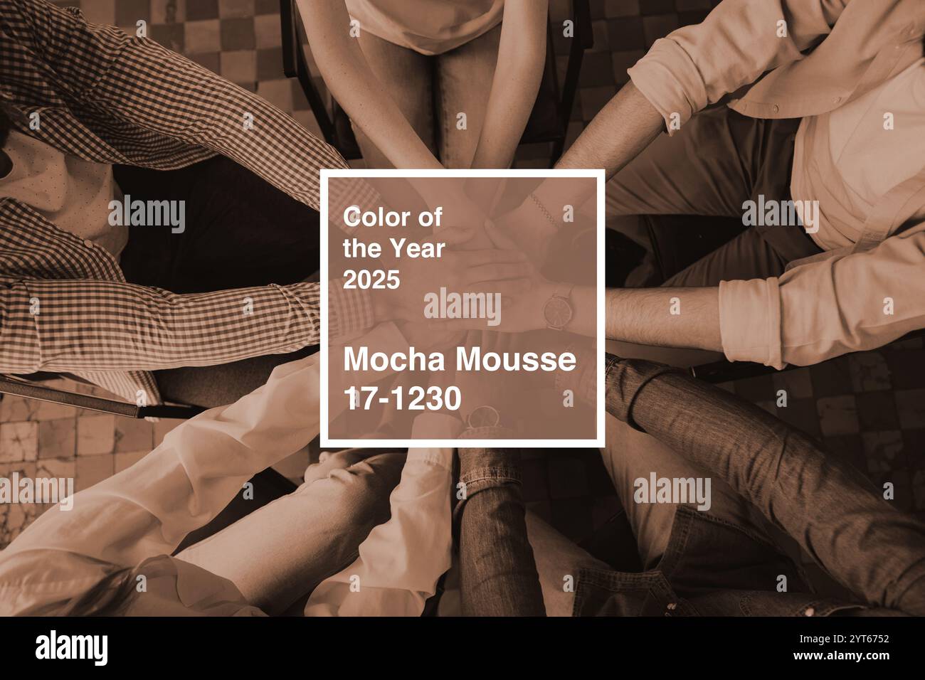 Group of friends sharing hands in unity showcasing color of the year ...