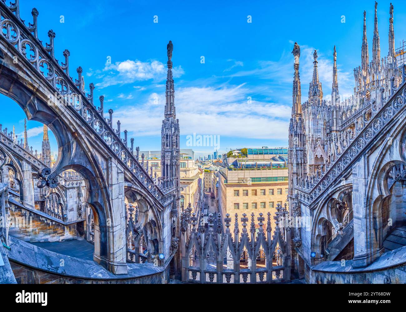 The view through the Gothic flying buttresses of Milan Cathedral ...