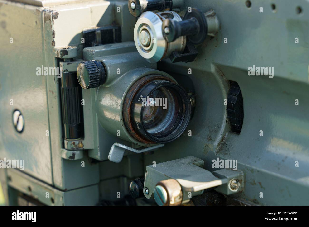 Focusing on an antique camera lens, this view reveals the delicate ...