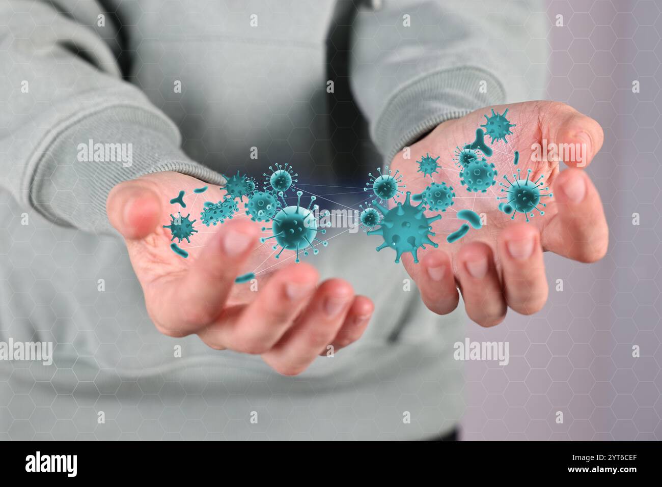 Man showing hands with microbes on grey background, closeup ...