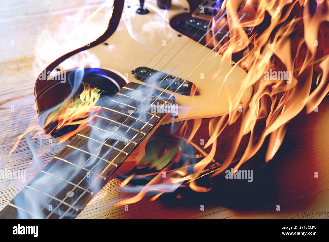 Electric guitar in flames and smoke, closeup. Creative poster Stock ...