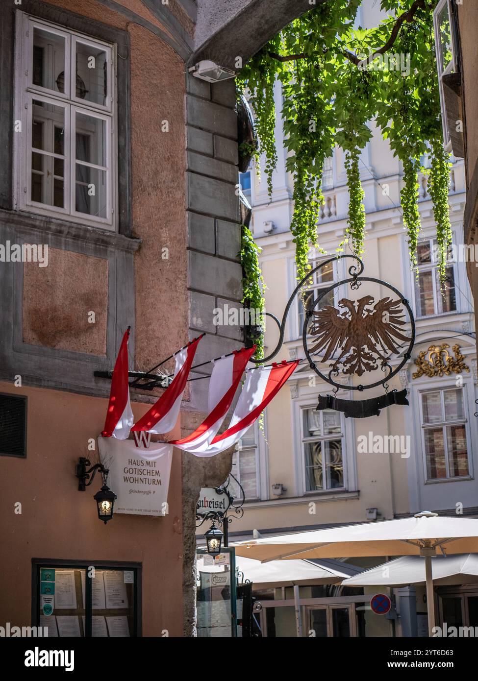Historic Austrian Building with Ornate Ironwork and Austrian Flag in ...