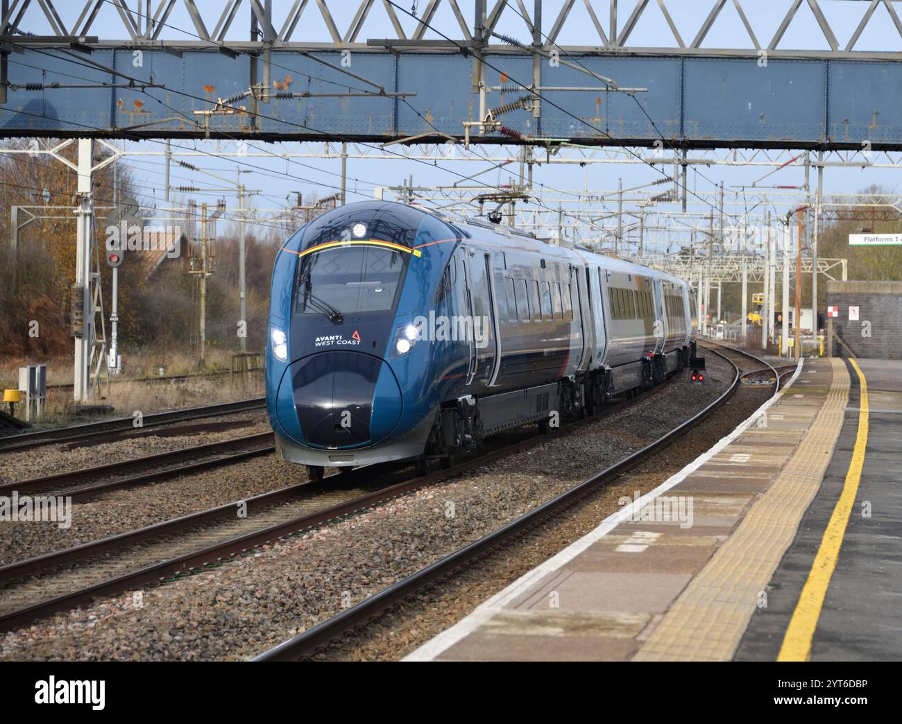 7-car Class 807 Evero 807004 rushes through Rugeley Trent Valley with ...