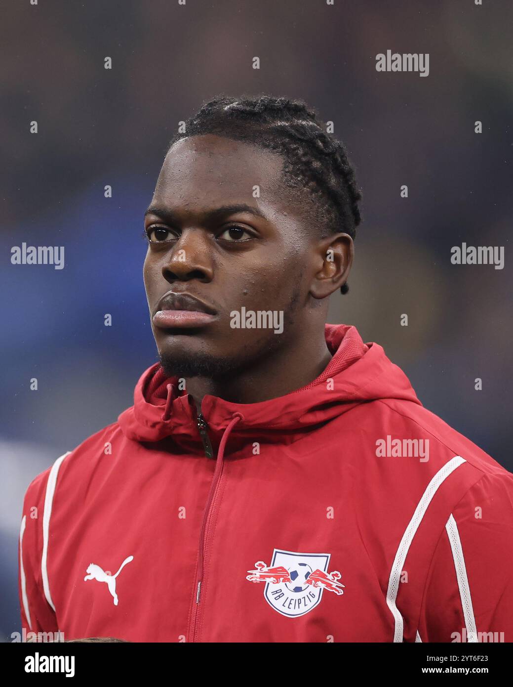 Milan, Italy, 26th November 2024. Castello Lukeba of RB Leipzig looks ...