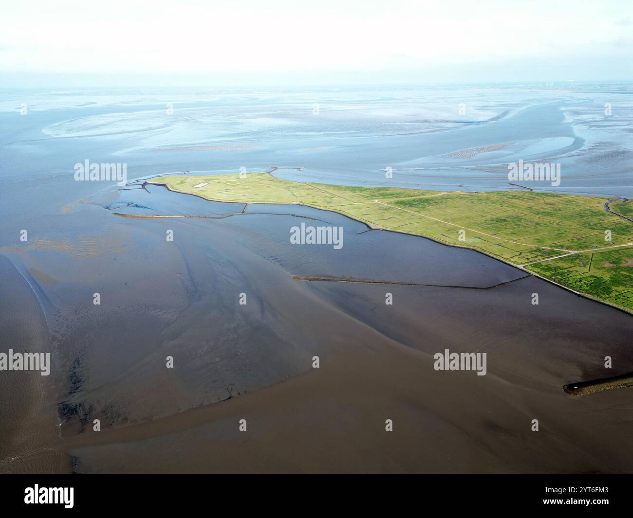 Aerial view of the tidal mudflats and channels of the Eemsdelta and ...