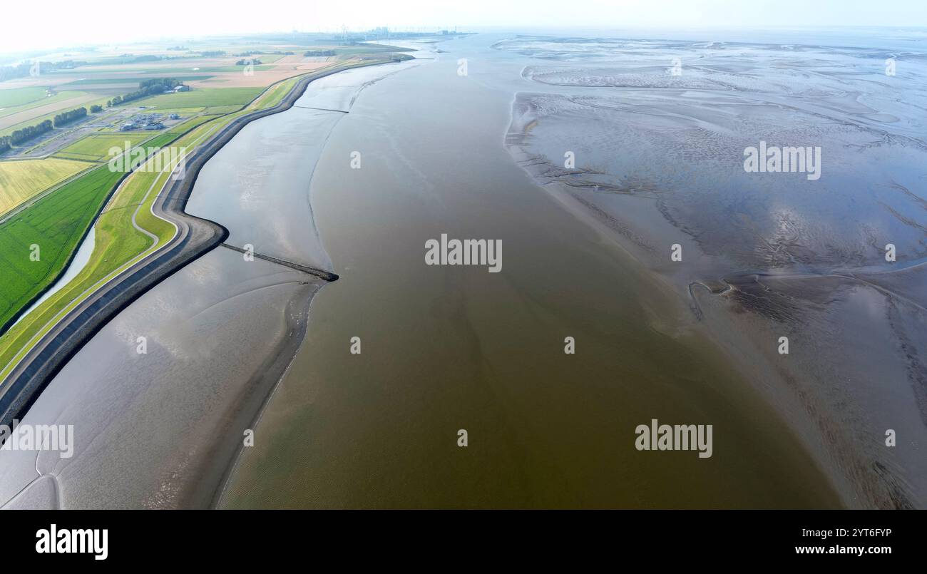 Aerial view of the tidal mudflats and channels of the Eemsdelta and ...