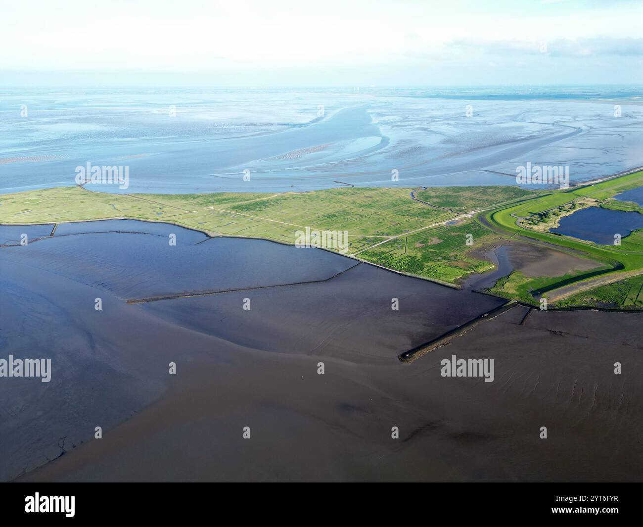 Aerial view of the tidal mudflats and channels of the Eemsdelta and ...