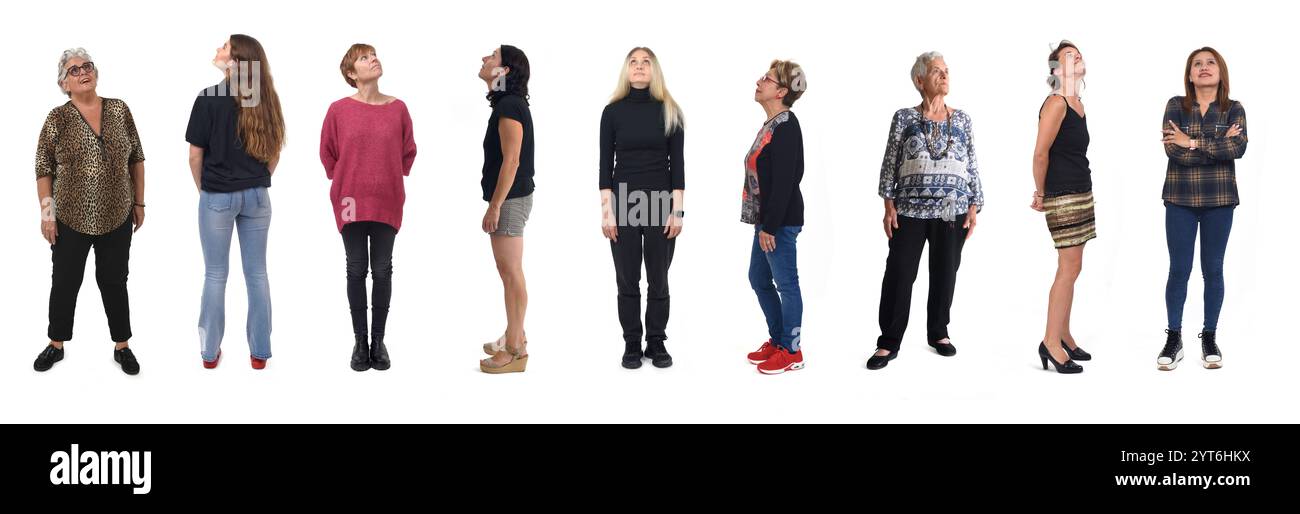 large group of women standing looking up on white background Stock ...