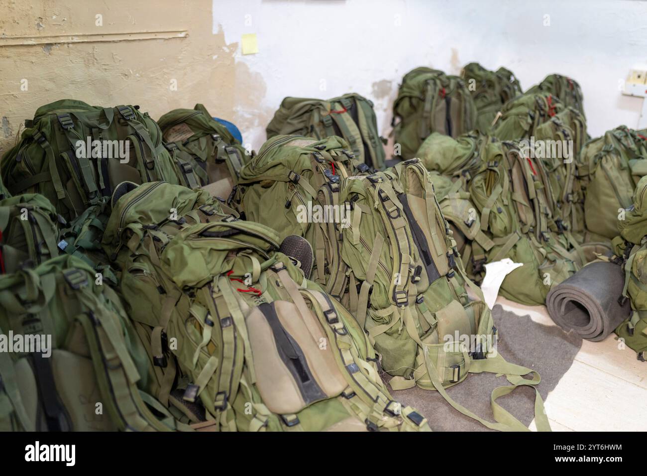 Old decommissioned military backpacks at a military base Stock Photo ...