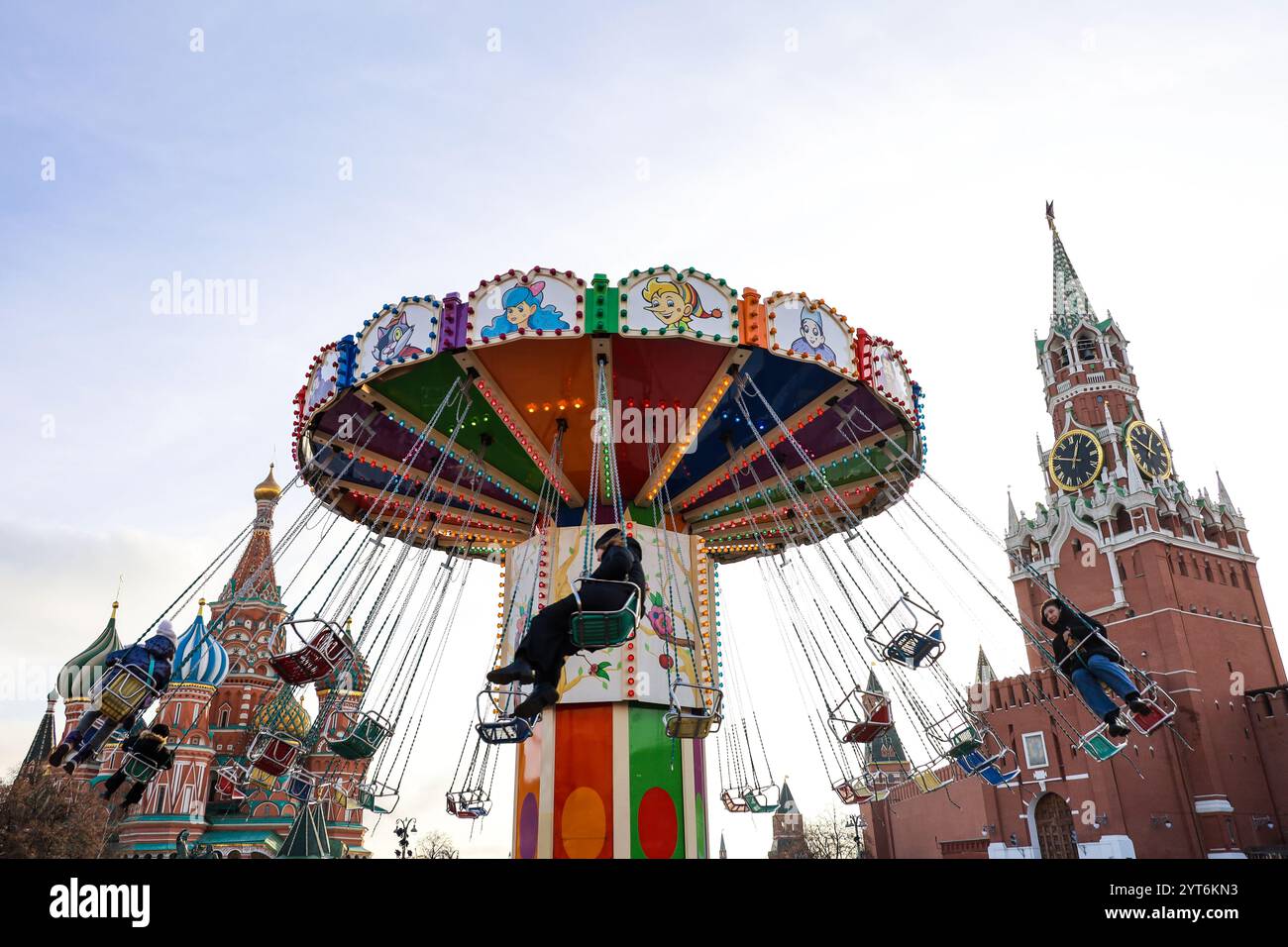 New Year celebration on Red square. Christmas fair with carousel on ...