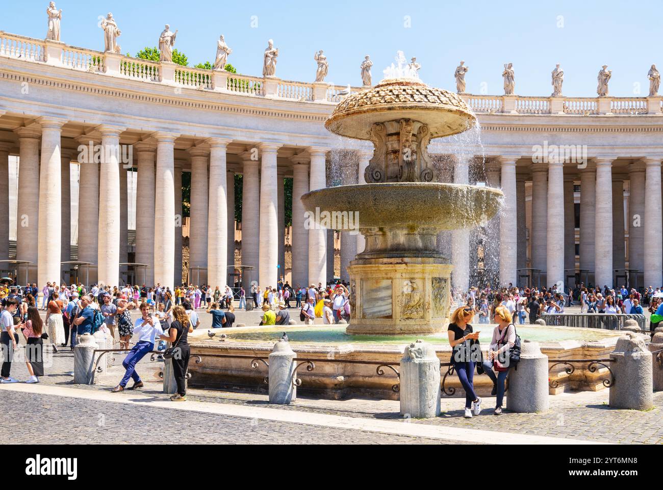 The colonnade and Maderno fountain on Saint Peter's Square, Vatican ...
