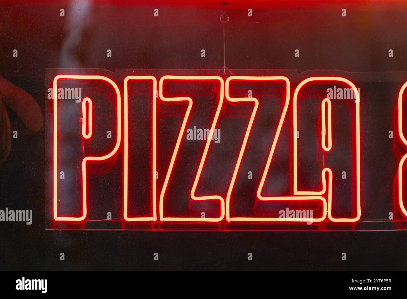 Pizza Red Neons Sign in Window of Italian Restaurant Stock Photo - Alamy