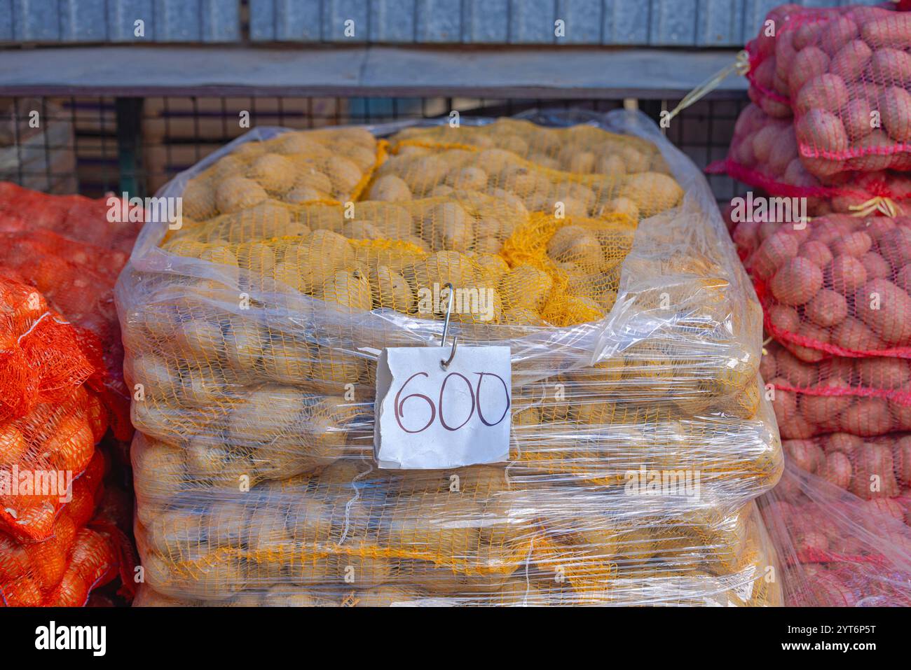 Sacks of Potato in Wrap Foil With Price Tag for Sale at Farmers Market ...