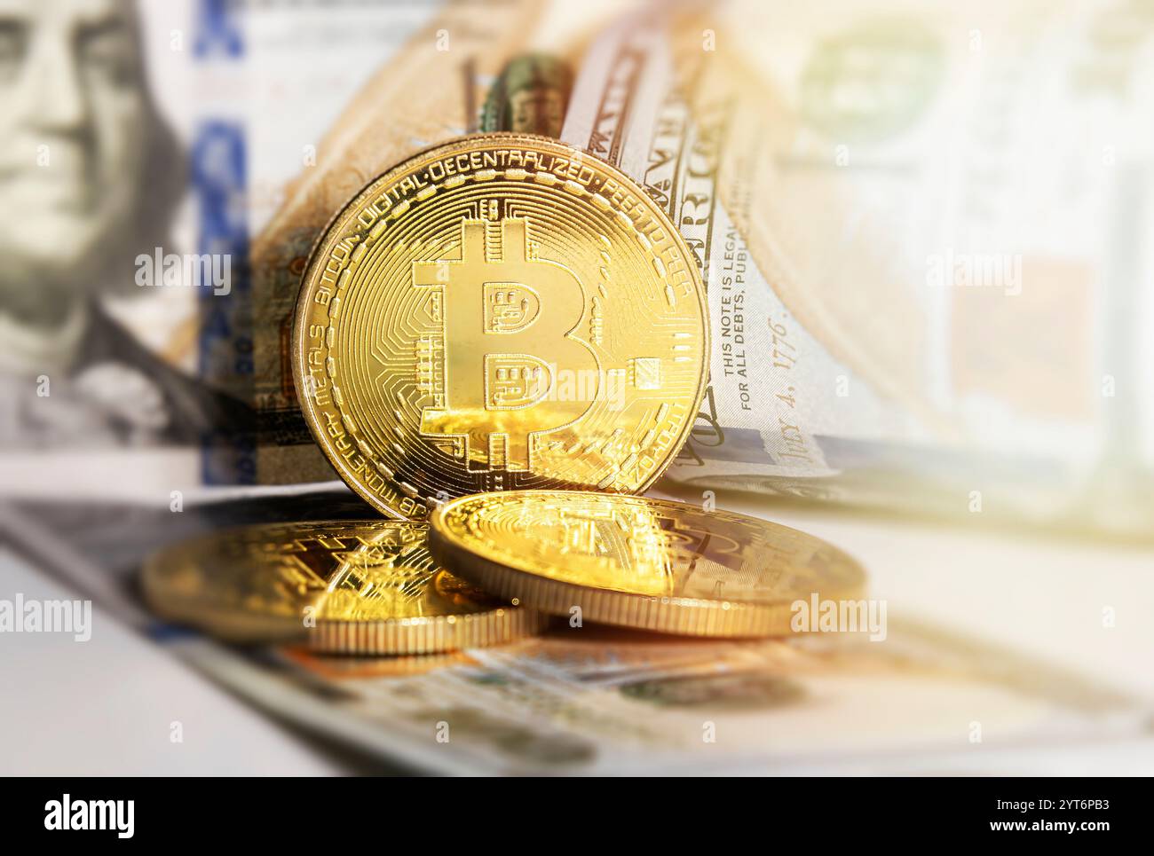 Bitcoin against dollar bills Stock Photo - Alamy