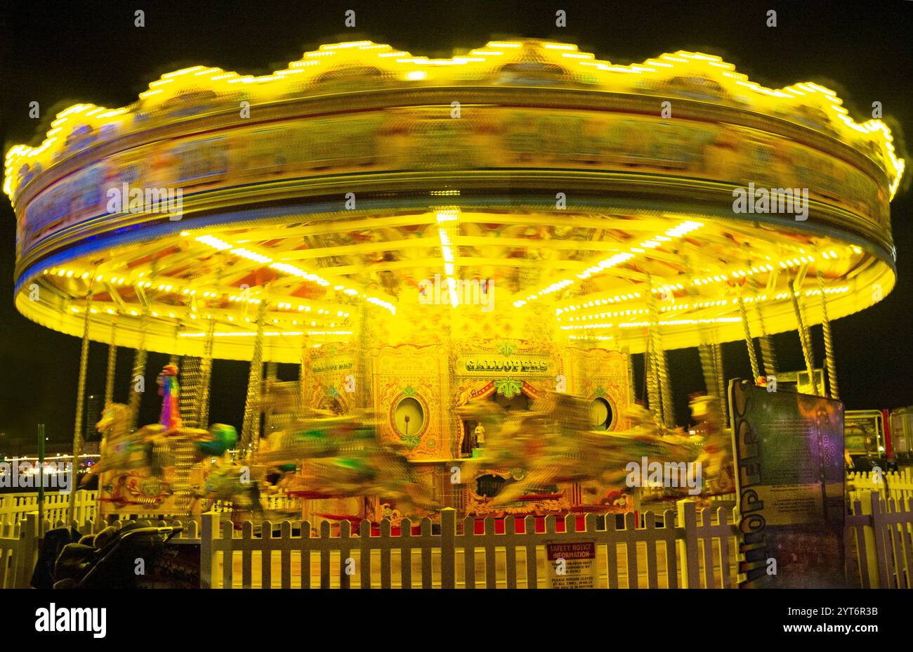 English carousel horses at night hi-res stock photography and images ...